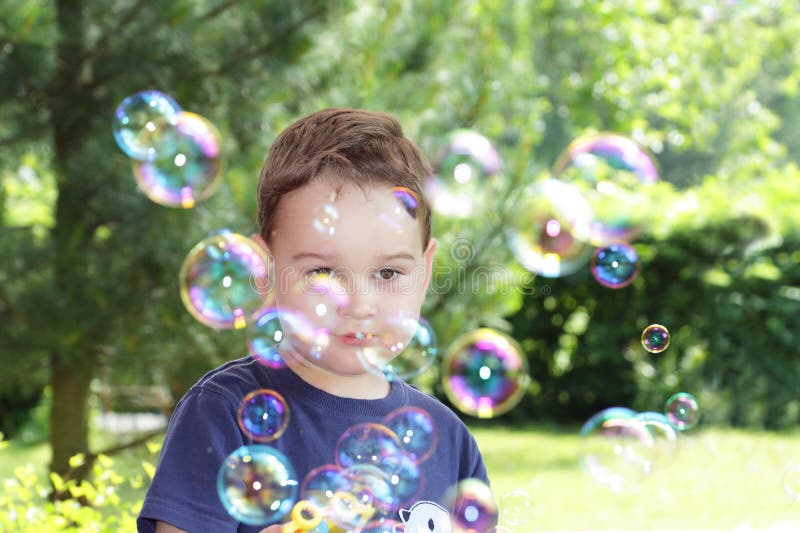 Girl Chasing Bubbles stock photo. Image of expressive - 6344574