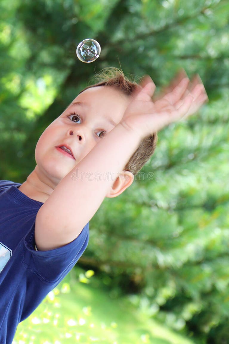 675 Child Catching Bubbles Stock Photos - Free & Royalty-Free Stock ...