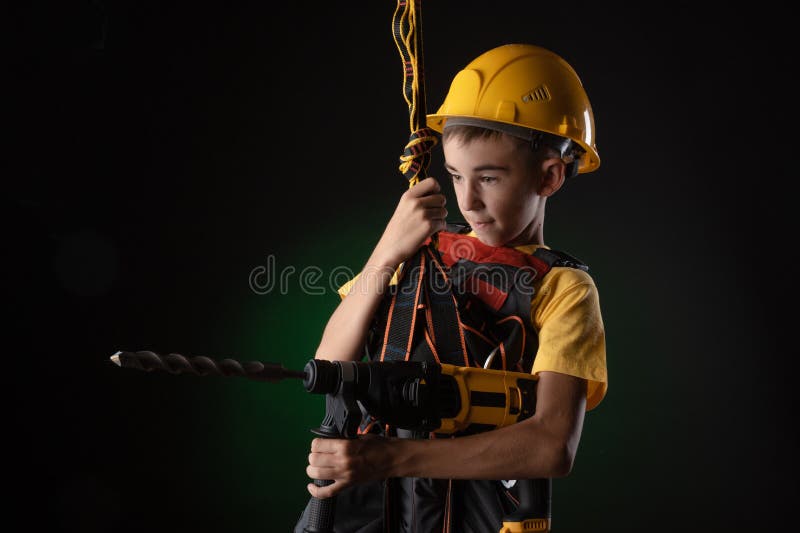 Child the Builder Costume Posing with a Work Tool Stock Photo - Image ...
