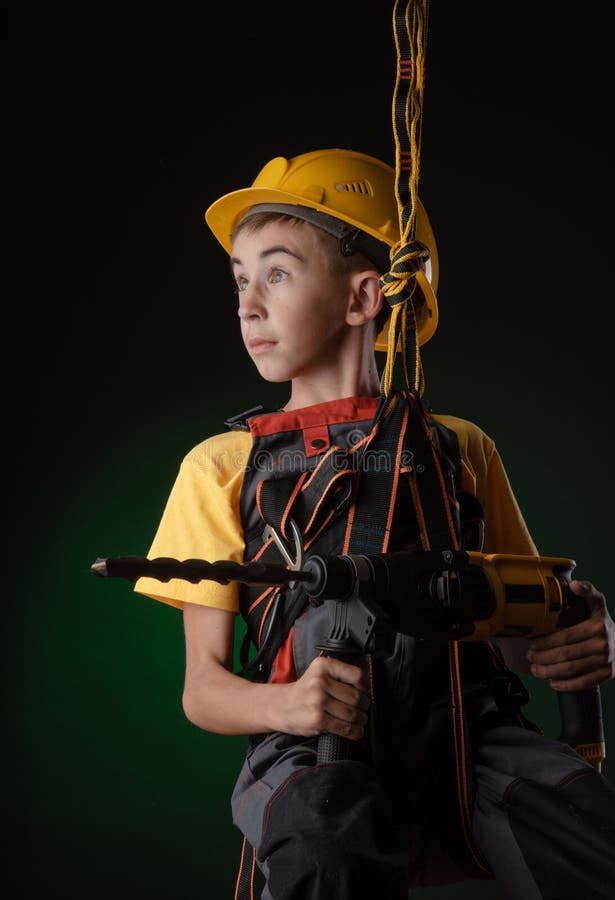 Child the Builder Costume Posing with a Work Tool Stock Image - Image ...