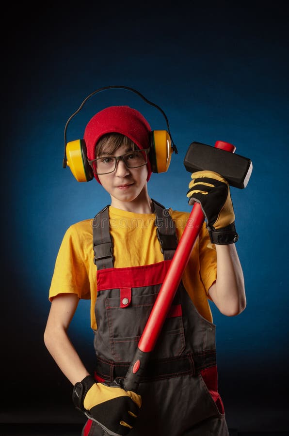 The Child the Builder Costume Posing with a Work Tool Stock Image ...