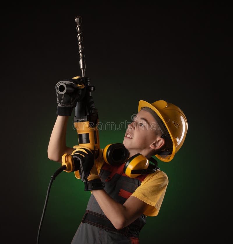 Child the Builder Costume Posing with a Work Tool Stock Photo - Image ...