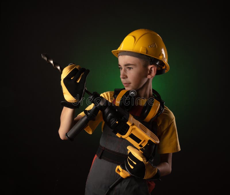 Child the Builder Costume Posing with a Work Tool Stock Image - Image ...