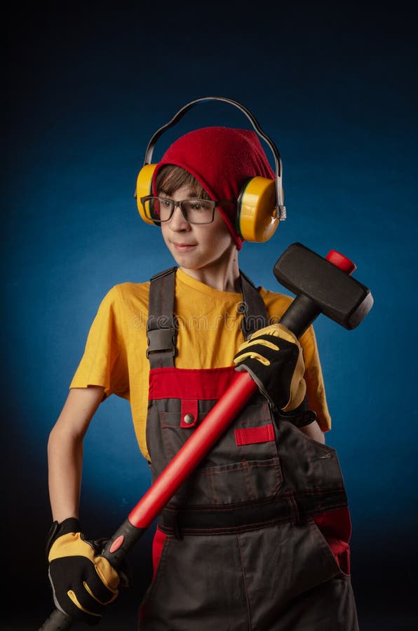 The Child the Builder Costume Posing with a Work Tool Stock Photo ...
