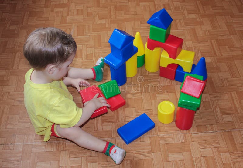 The Child Builds a Castle Out of Plastic Designer. Game with the ...