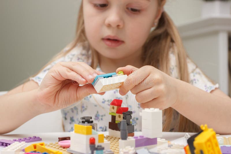 Child Builds with Constructor Bricks, Plays with Toys Stock Image ...