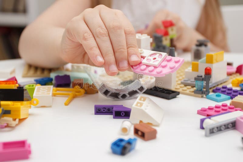 Child Builds with Constructor Bricks, Plays with Toys Stock Image ...