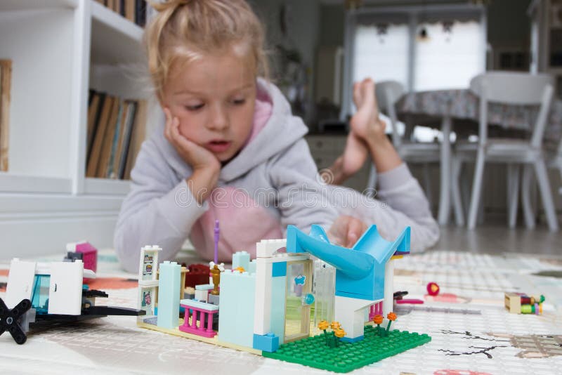 Child Builds with Constructor Bricks, Plays with Toys Stock Image ...