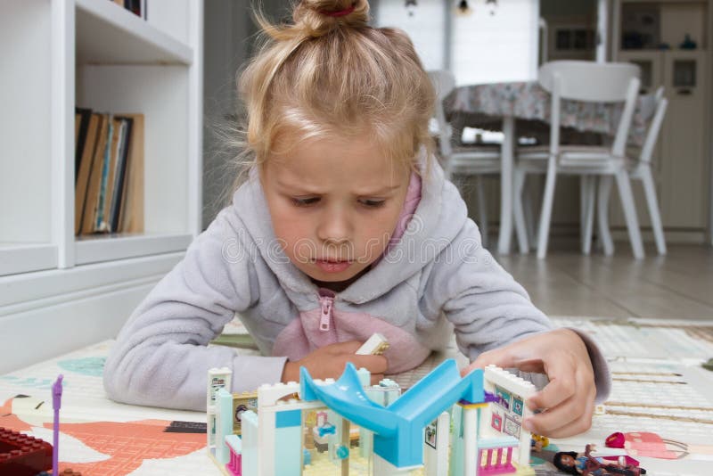 Child Builds with Constructor Bricks, Plays with Toys Stock Image ...