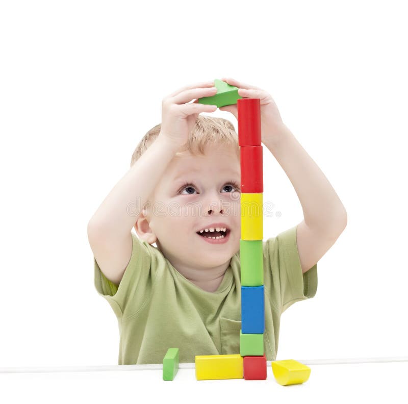 The Child Builds a Toy Tower Stock Image - Image of face, cute: 57423437
