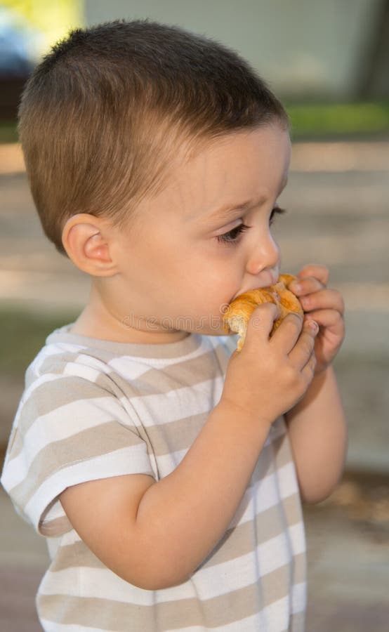 Child with a bun stock image. Image of enjoy, summer - 46386381