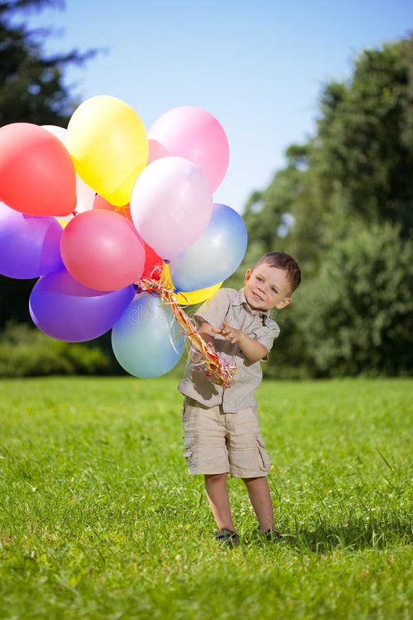 Child with a Bunch of Balloons in Their Hands Stock Image - Image of ...