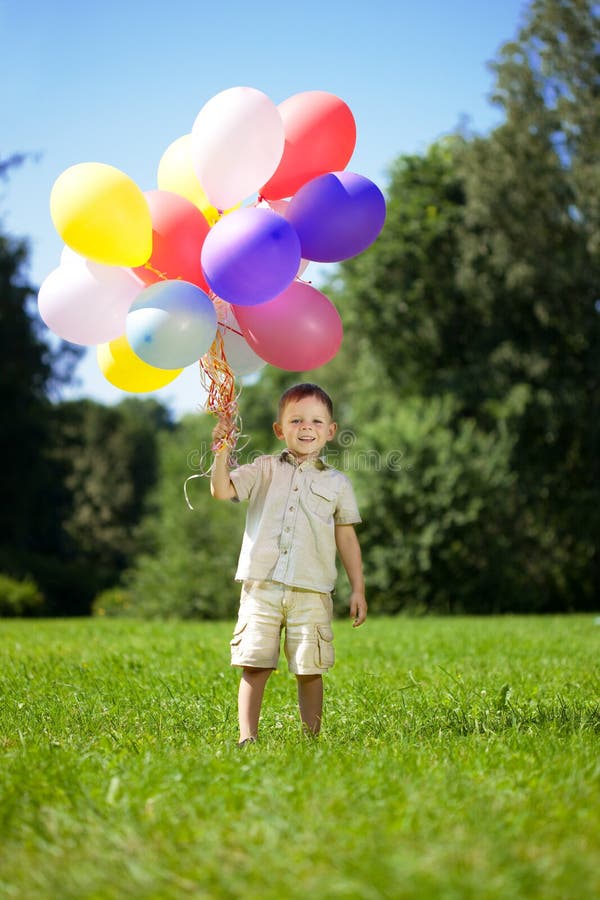 Child with a Bunch of Balloons in Their Hands Stock Image - Image of ...