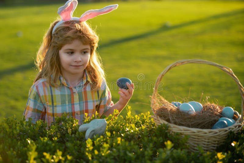 Child Bunny Boy with Rabbit Bunny Ears. Child Boy Hunting Easter Eggs ...