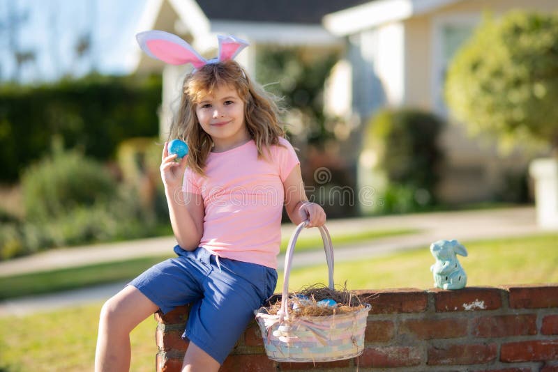 Child in Bunny Ears Hold Easter Egg. Boy Hunting Easter Egg. Boy in ...