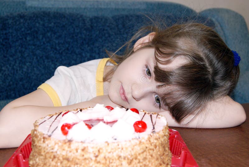 The child with a cake stock photo. Image of desire, eyes - 14321792