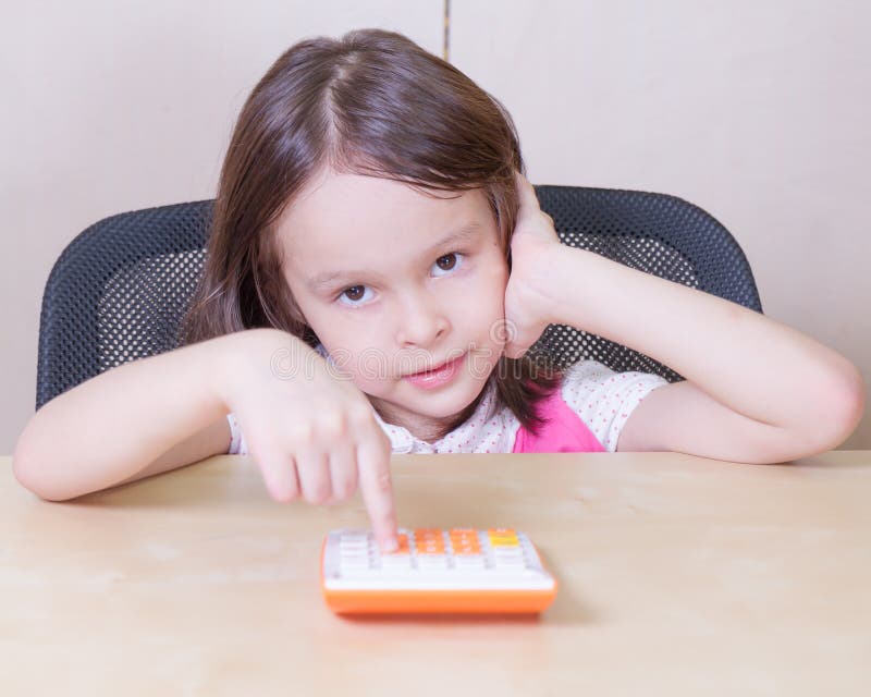 Child with a calculator stock photo. Image of money, cute - 33078512