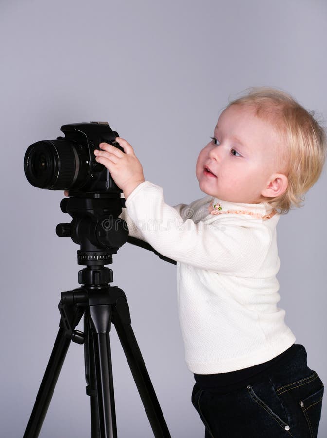 A Child with a Camera in the Studio Stock Photo - Image of attentive ...