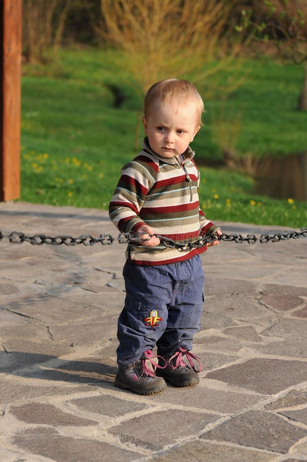 Child with chain stock image. Image of nature, chain - 30804085