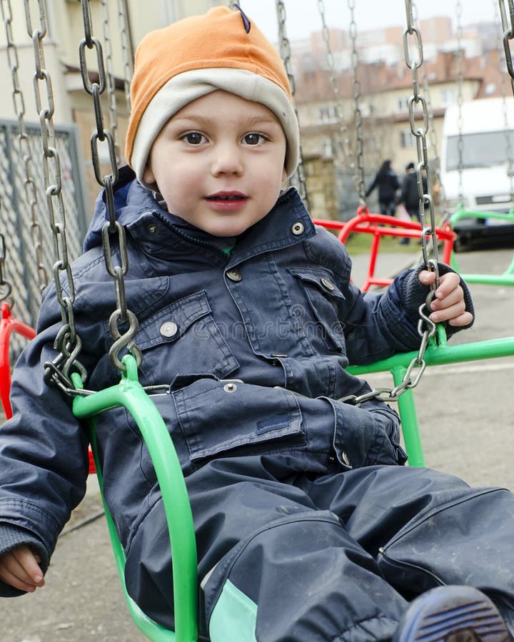 Child on chain swing stock photo. Image of caucasian - 38883206