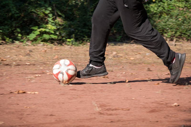 Child chasing a ball stock photo. Image of play, game - 77737154
