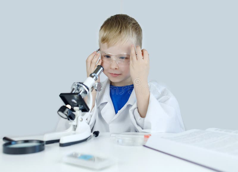 Child Chemist. Teacher Shows a Visual Experiment. a Science Mentor ...