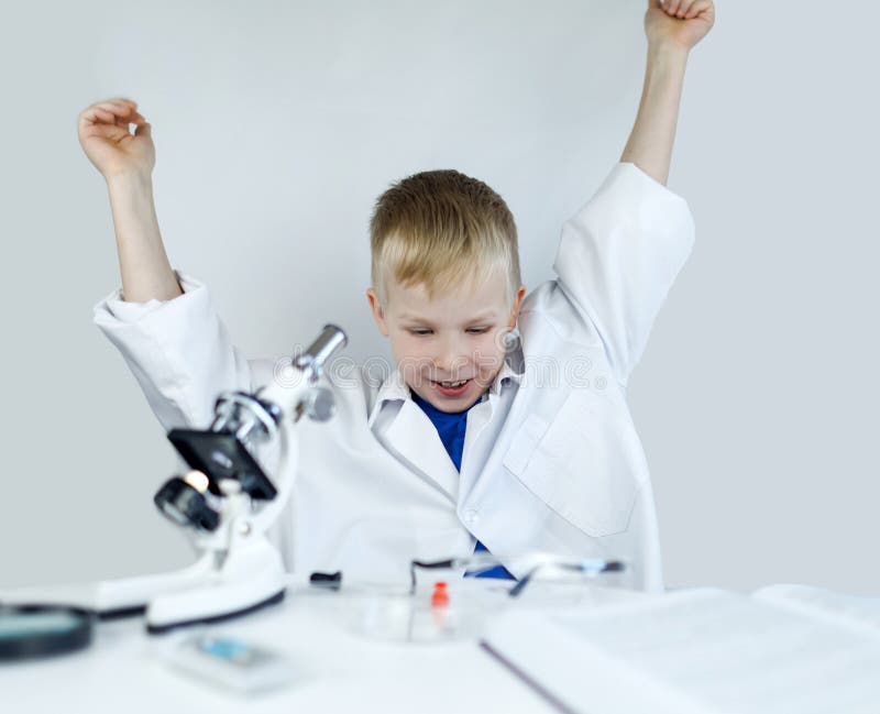 Child Chemist. Teacher Shows a Visual Experiment. a Science Mentor ...