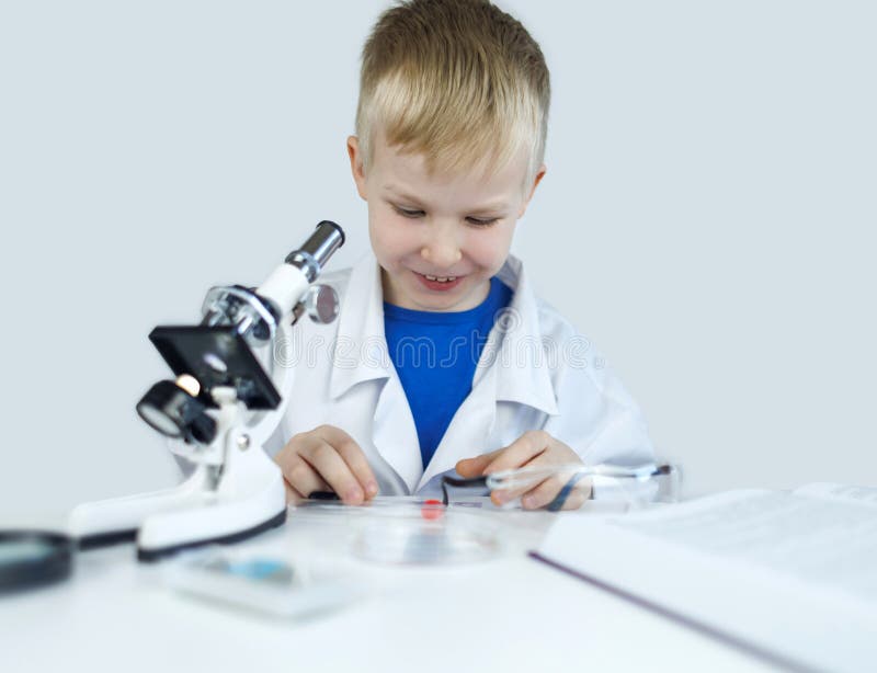 Child Chemist. Teacher Shows a Visual Experiment. a Science Mentor ...