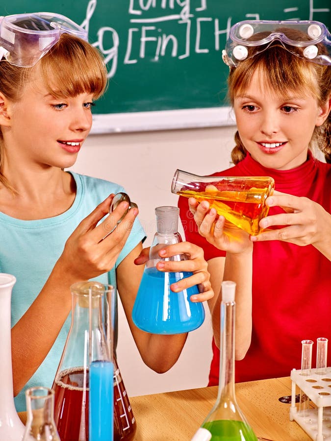 Child in chemistry class stock image. Image of children - 54911011
