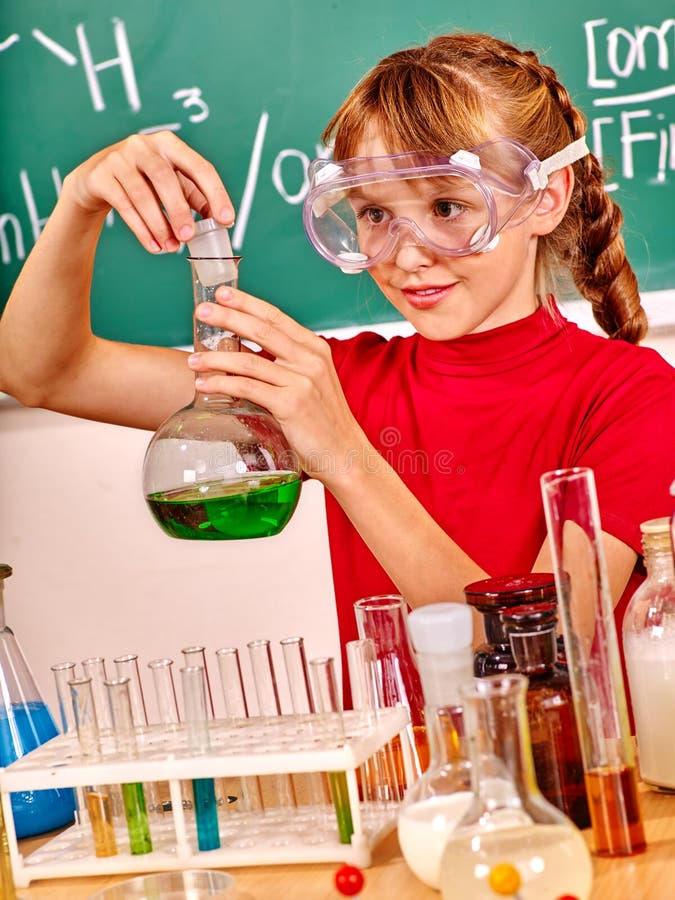 Child in chemistry class. stock photo. Image of girl - 73560474