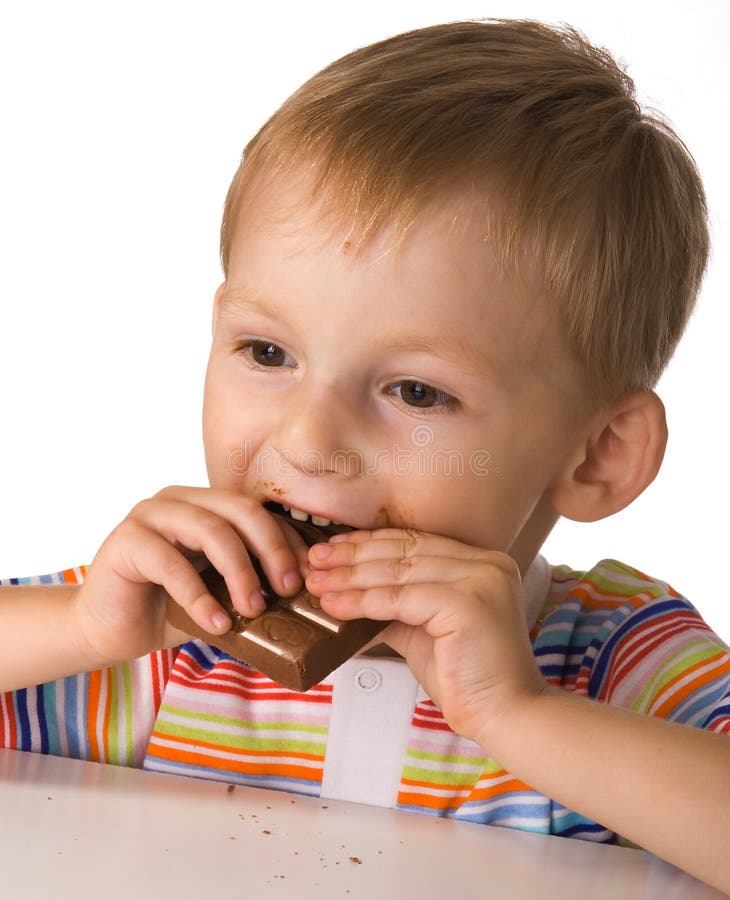 The child with a chocolate stock image. Image of cheerful - 3032251