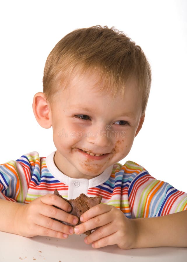 The child with a chocolate stock photo. Image of childhood - 3032236