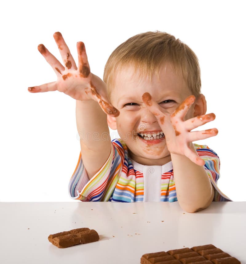 The child with a chocolate stock image. Image of cheerful - 3032251