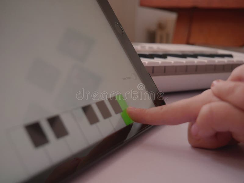 Child Choosing Correct Answer Tablet Music App Hands Close Up Stock ...