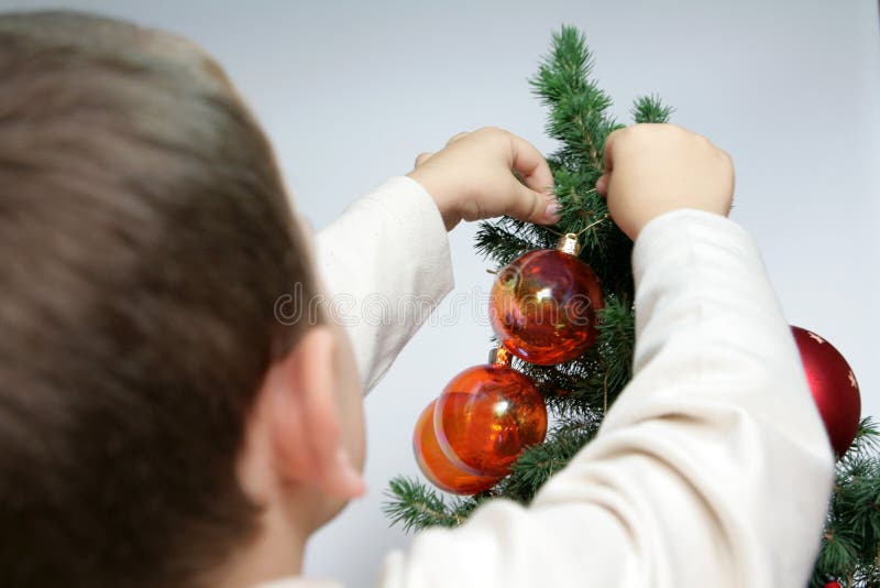 Child and christmas tree stock image. Image of gold, childcare - 3579041