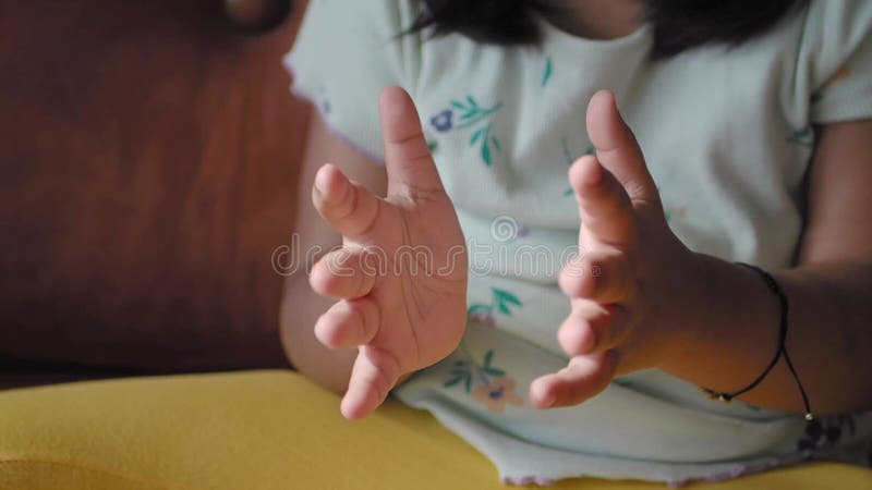 Child Clapping Hands and Smiling, Sitting on Sofa . Stock Footage ...