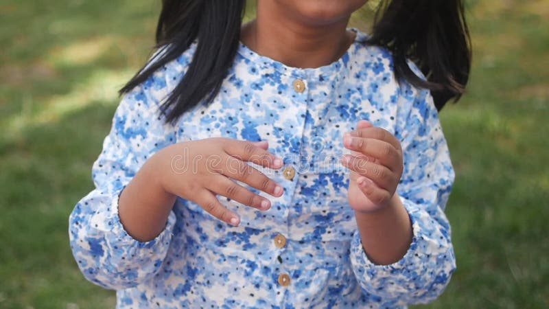 Child Clapping Hands and Smiling, Sitting on Sofa . Stock Video - Video ...