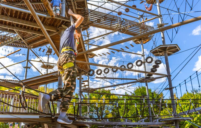 Child Climbing in the High Ropes Course Stock Image - Image of danger ...
