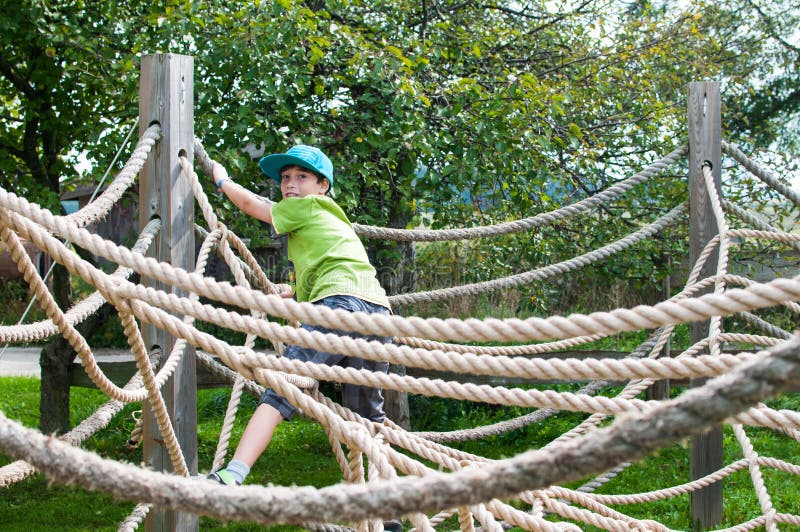 Child Climbing at the Playground Stock Photo - Image of play, child ...