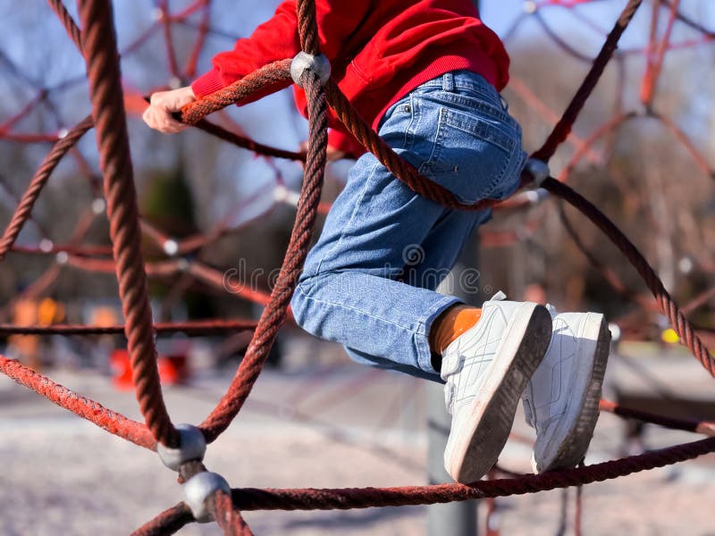 Child Climbing on Playground Rope Structure Outdoors Stock Image ...