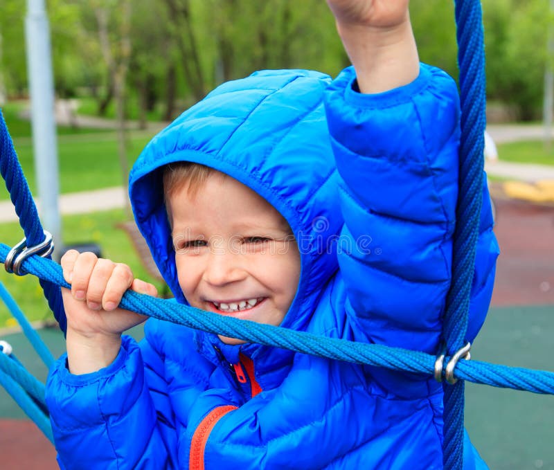Child Climbing Rope on the Playground Stock Image - Image of daycare ...