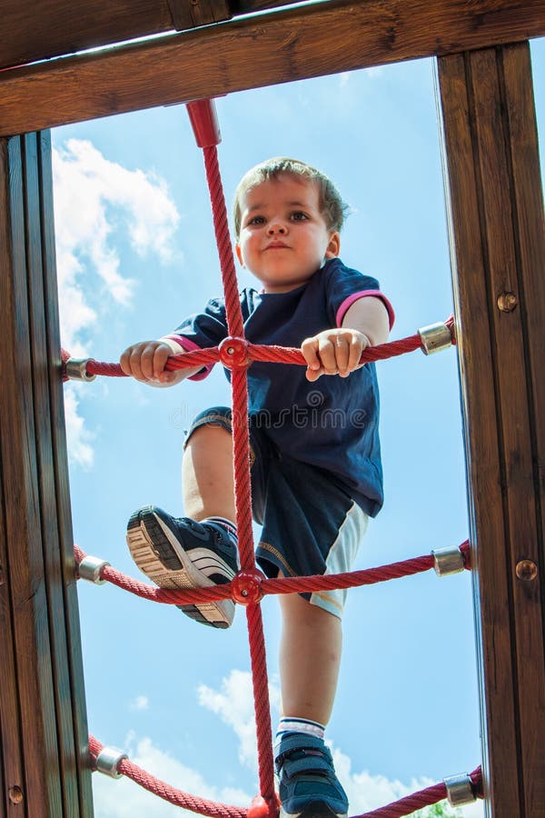 Child Climbing Ropes in a Playground Stock Image - Image of leisure ...