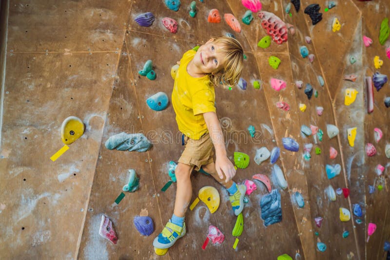 Child Climbing on a Wall in an Outdoor Climbing Center Stock Photo ...