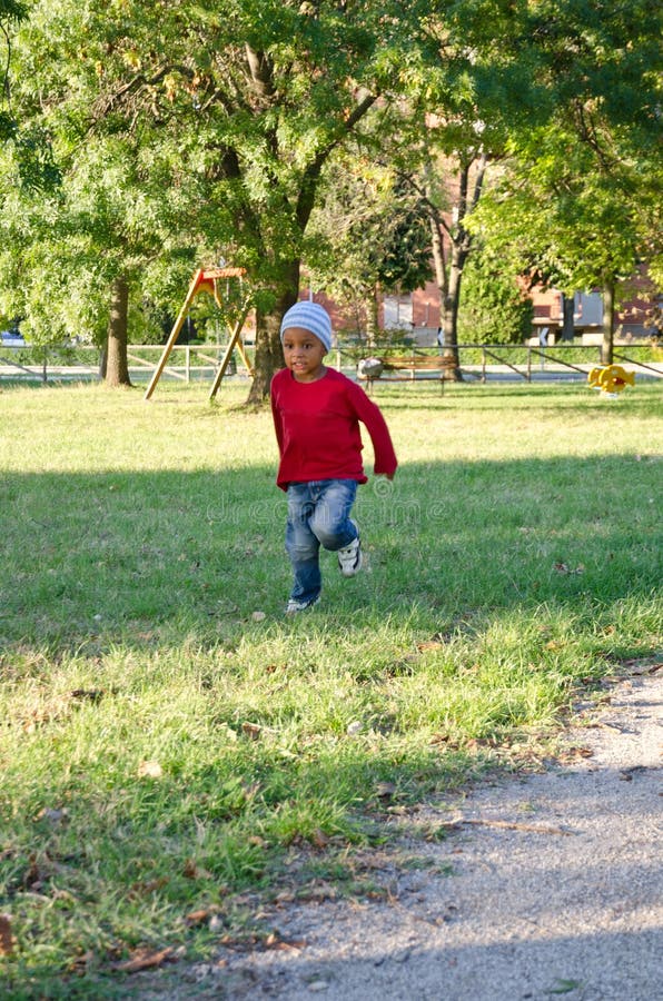 Child of color that runs stock image. Image of color - 39737997