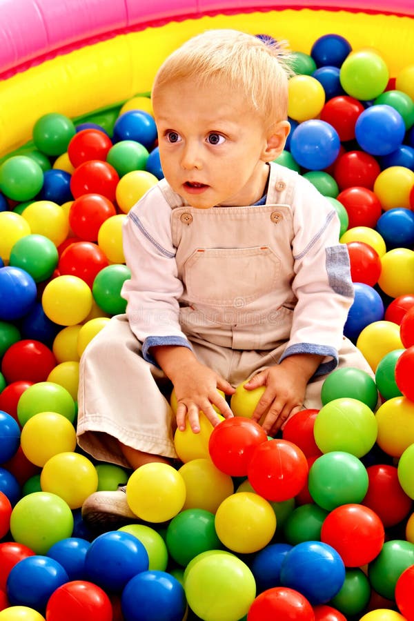 Child in colored ball. stock image. Image of party, people - 37504231