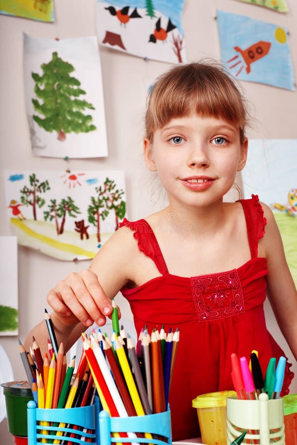 Child with Colour Pencil Draw in Preschool. Stock Image - Image of ...