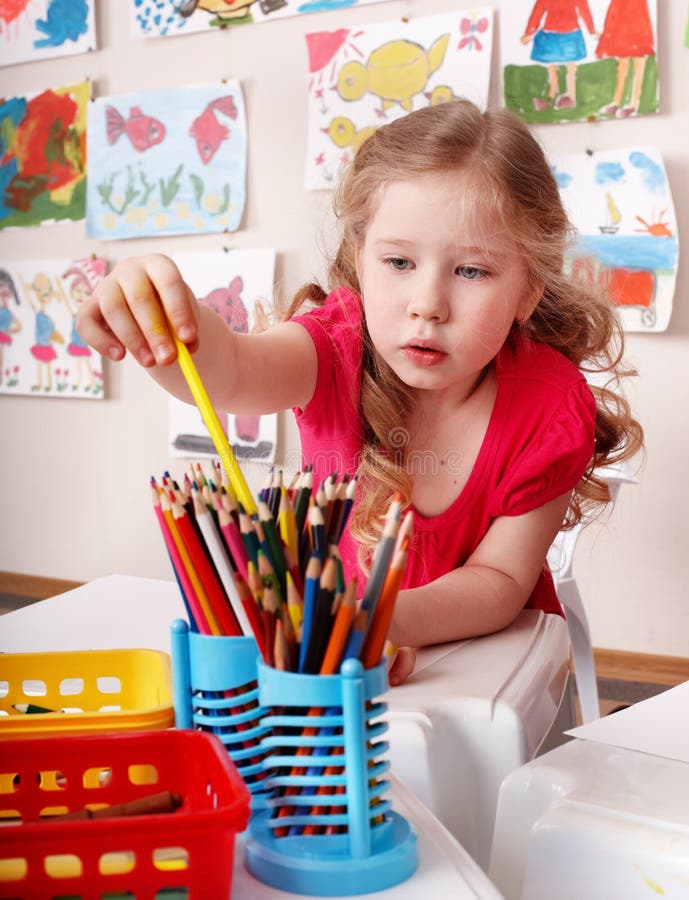 Child with Colour Pencil Draw in Preschool. Stock Image - Image of ...