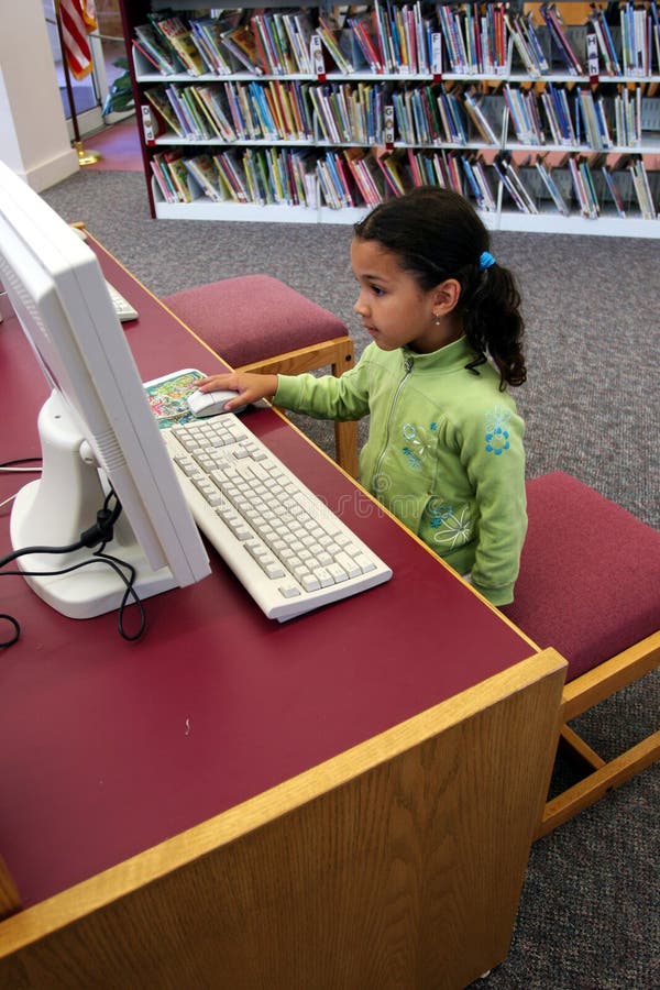 Child on Computer with Teacher Stock Photo - Image of learning, library ...