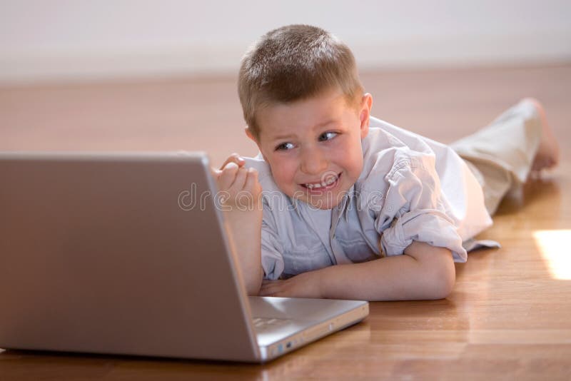 Child using a computer stock image. Image of stares, keyboard - 1981523