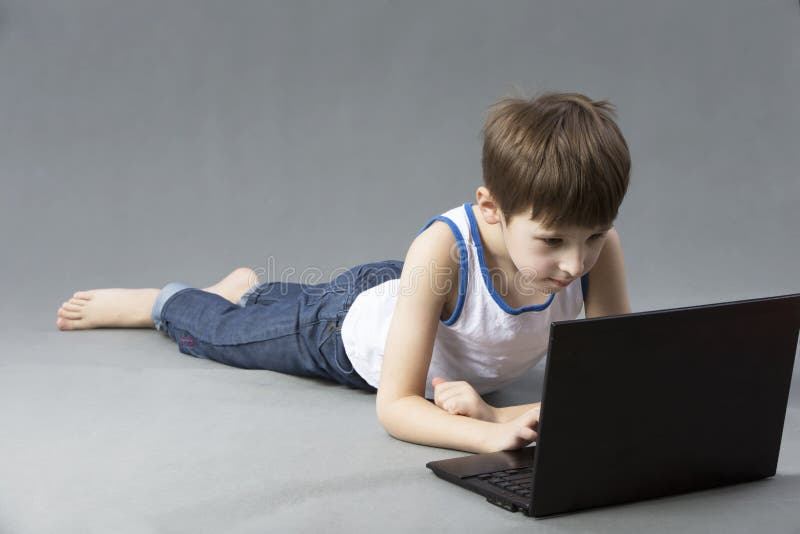 Child with a computer. stock photo. Image of happy, little - 181073334